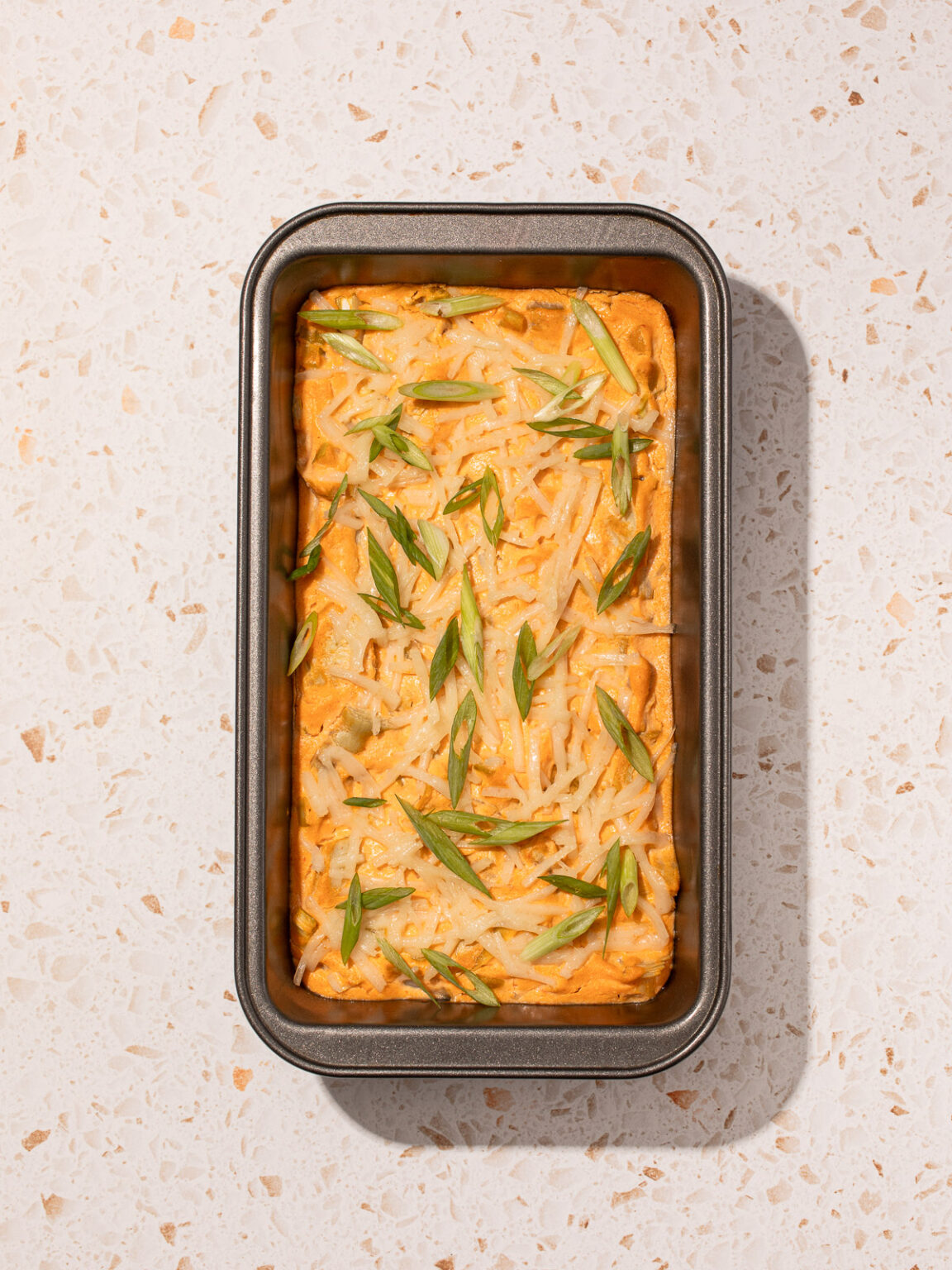 Vegan Baked Buffalo Chicken Dip with Artichokes - Desiree Nielsen