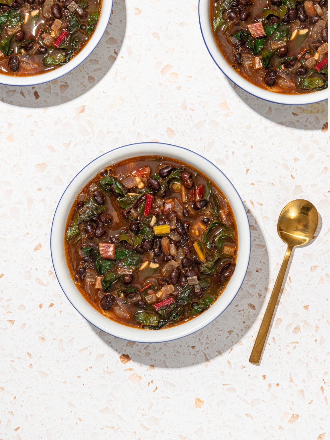 Garlicky Black Bean Soup with Swiss Chard - Desiree Nielsen
